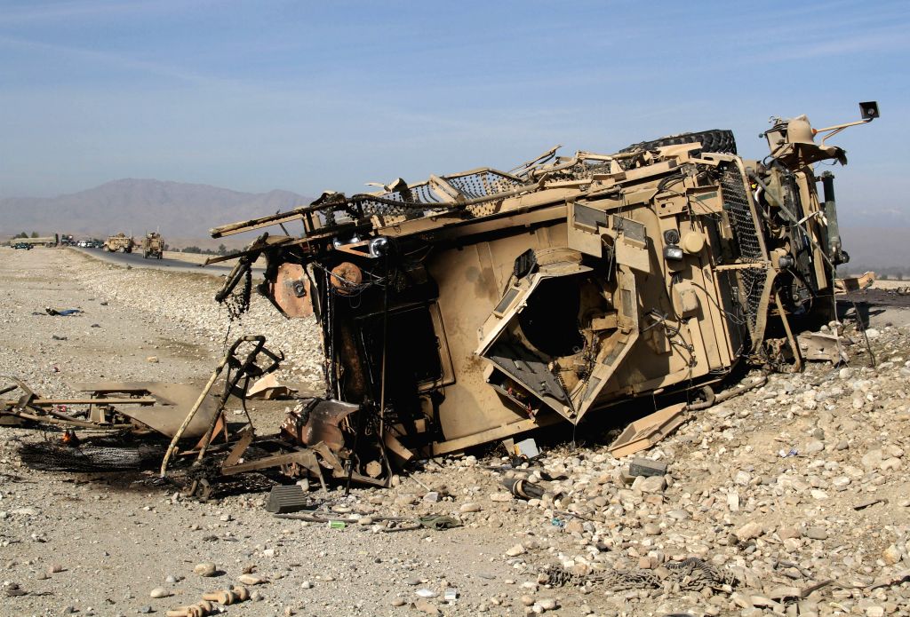 Nangarhar (Afghanistan): A destroyed U.S. military vehicle is seen at ...