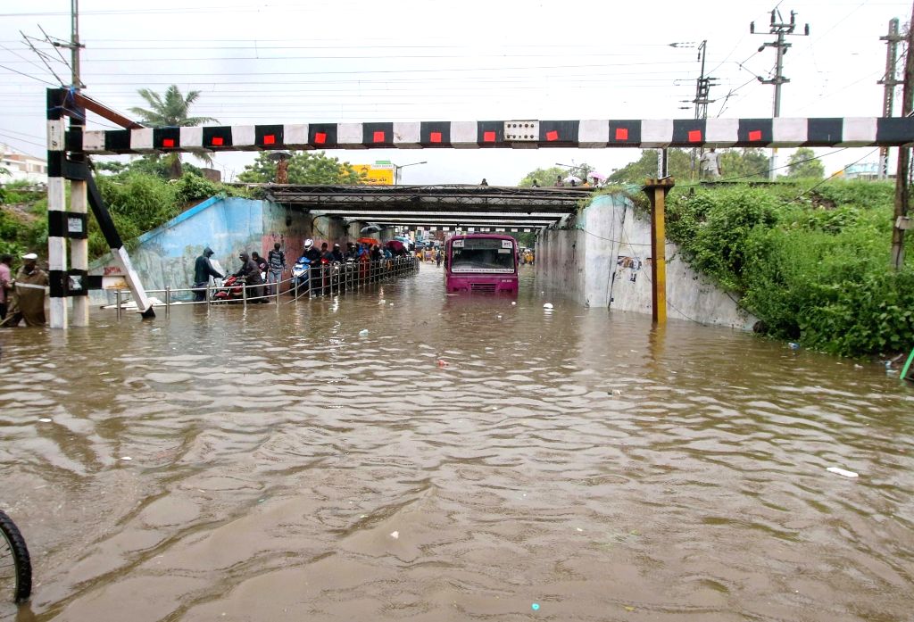 A bus submerged partially in a flooded-water