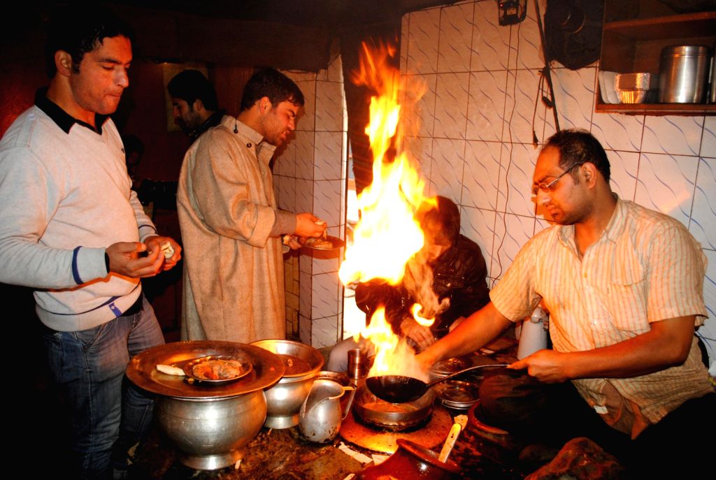A chef prepares 'Harisa' - A special Kashmiri delicacy