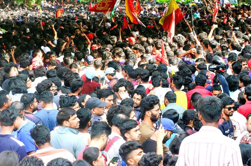 A huge crowd RCB fans gather outside M Chinnaswamy Stadium in Bengaluru