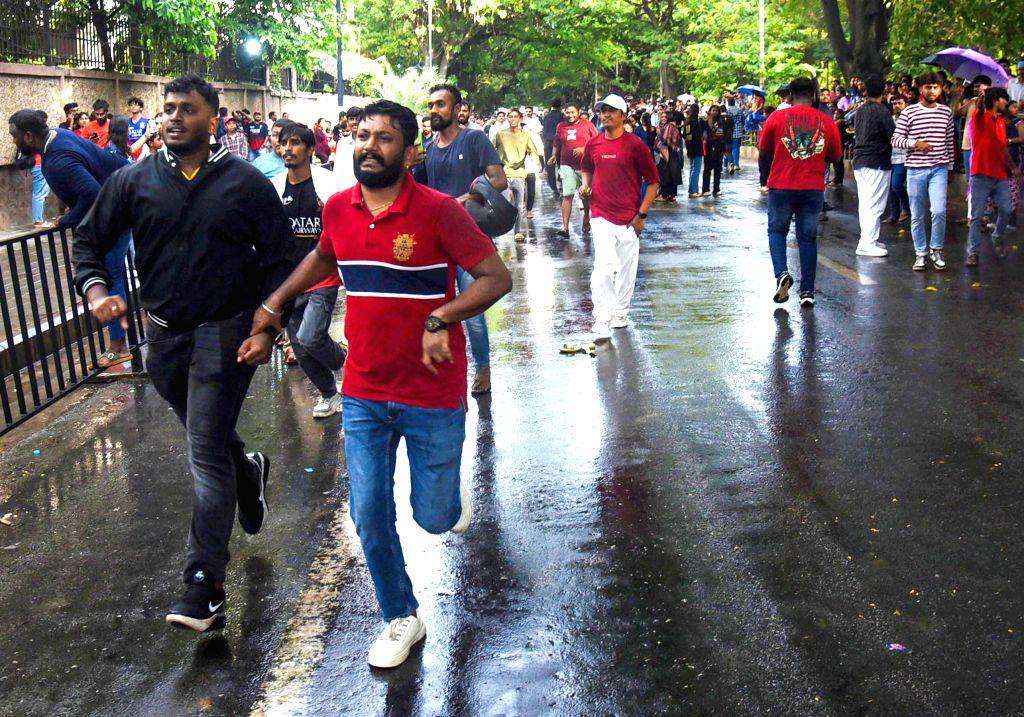 A huge crowd RCB fans gather outside M Chinnaswamy Stadium in Bengaluru