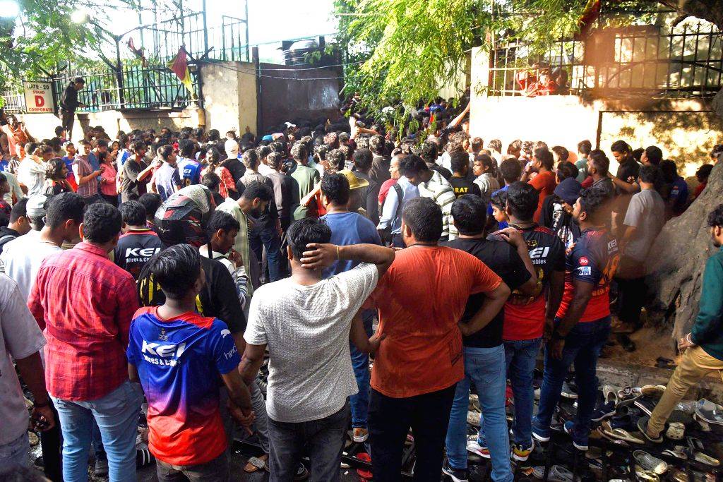 A huge crowd RCB fans gather outside M Chinnaswamy Stadium in Bengaluru