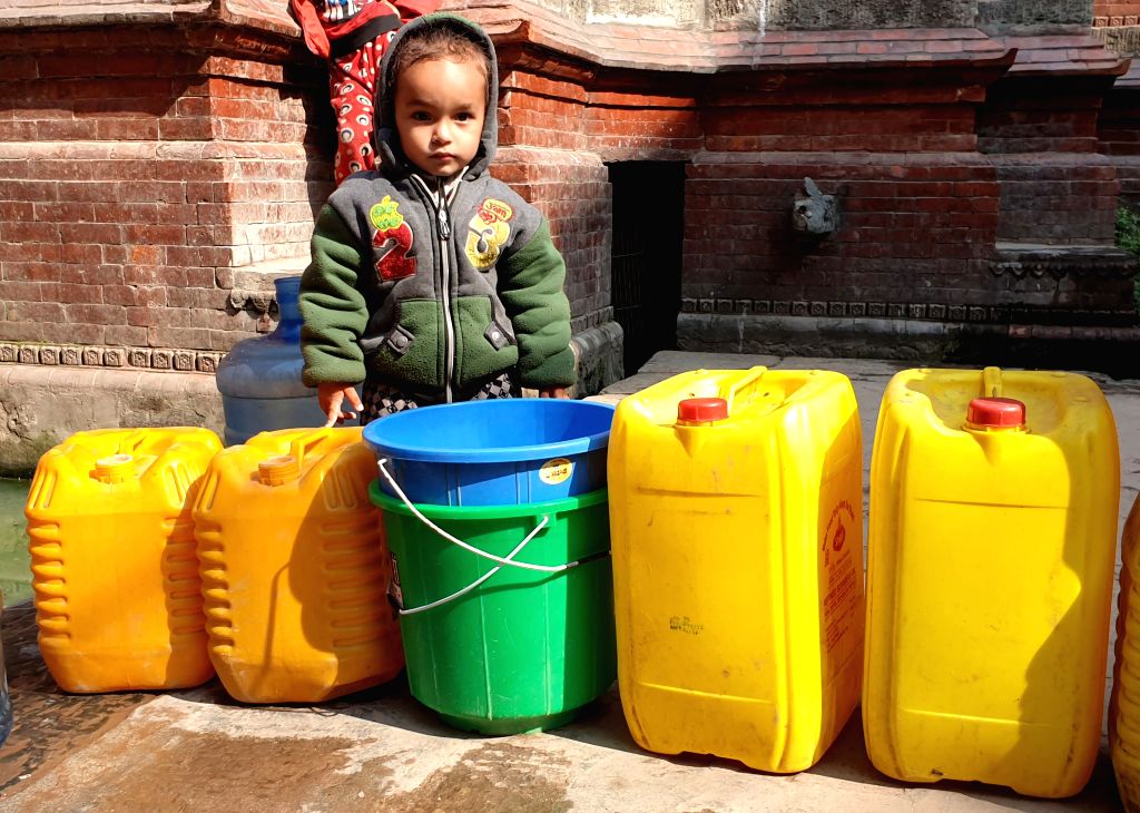 NEPAL-KATHMANDU-FETCHING WATER