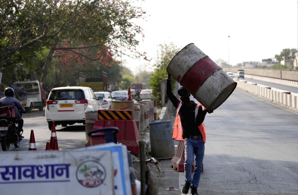 A labourer at a construction site of Chirag Delhi flyover