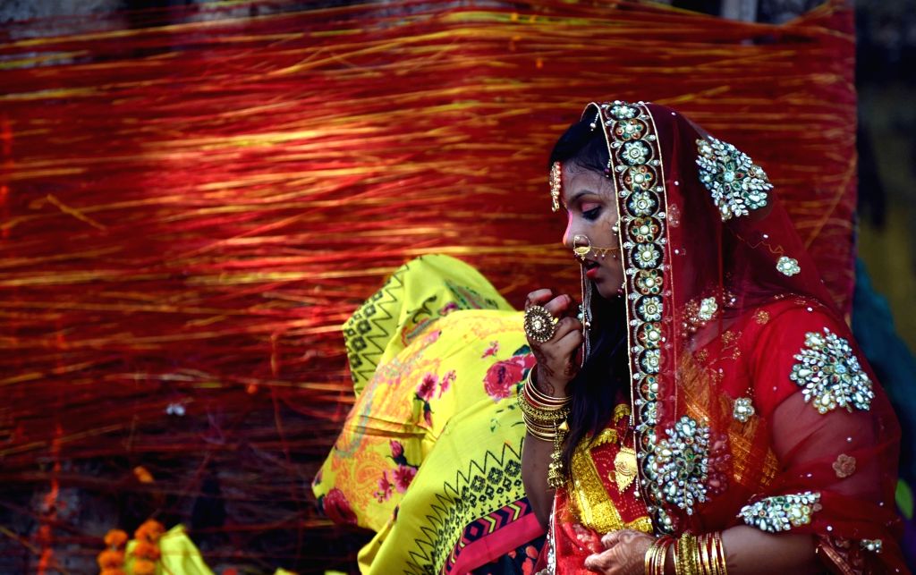 A married woman performs rituals near a 'Banyan' tree on the occasion ...