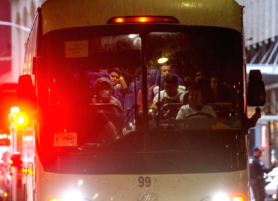 New York:A migrant bus arrives at the Port Authority bus terminal in ...