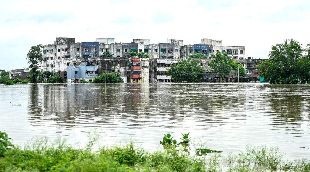 A portion of the city seen semi-engulfed in flood water following heavy ...
