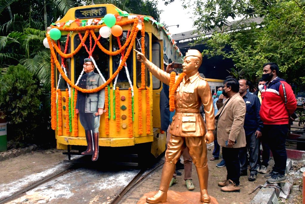 Kolkata :A tram decorated with flowers and photographs of Netaji runs ...