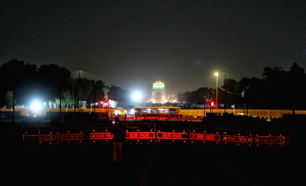 A view of India Gate light on off after and before during the Earth Hour