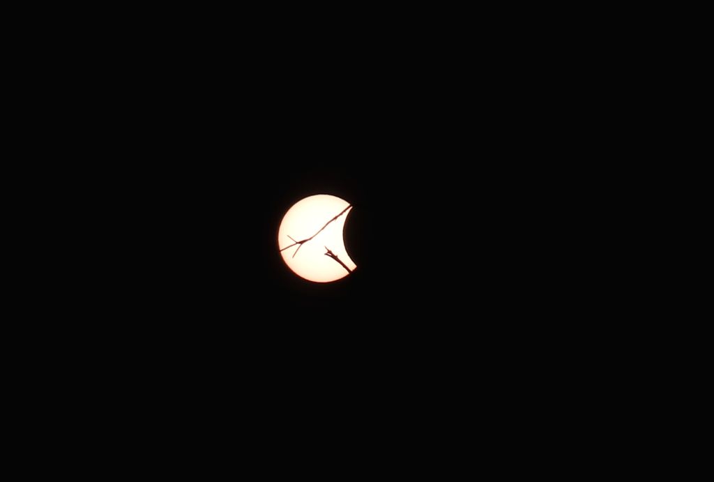 New Delhi: A view of partial Solar Eclipse seen in the sky