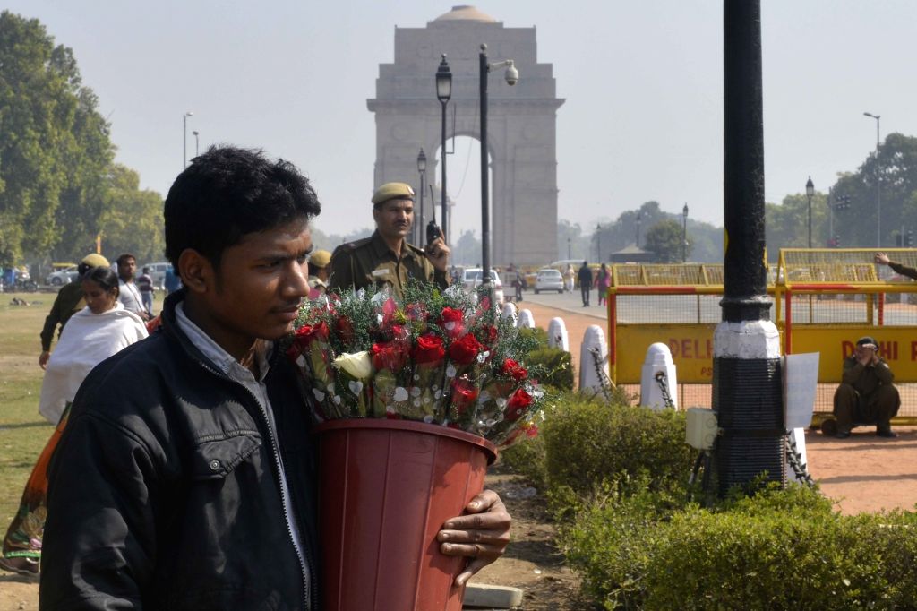 A young boy selling roses on Valentine's Day
