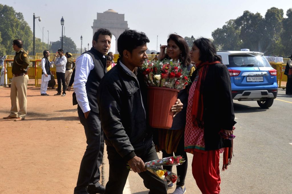 A young boy selling roses on Valentine's Day