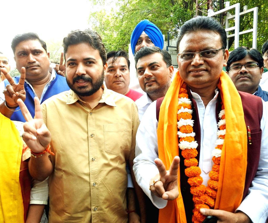 AAP MLA Durgesh Pathak with party candidate during the MCD Election ...