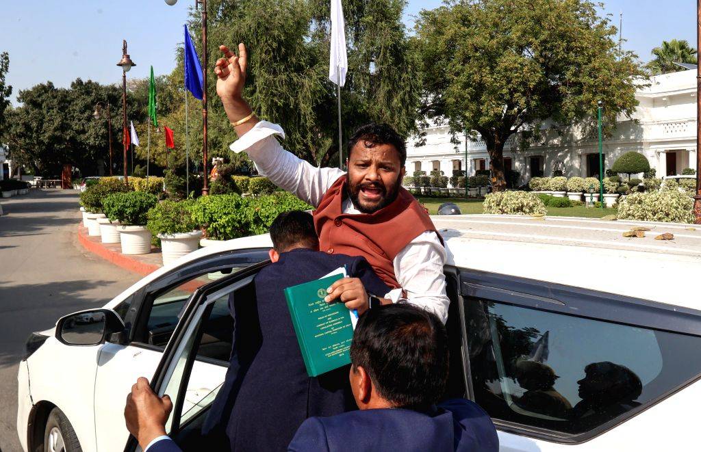 AAP MLA Kuldeep Kumar being marshalled out of Delhi Vidhan Sabha