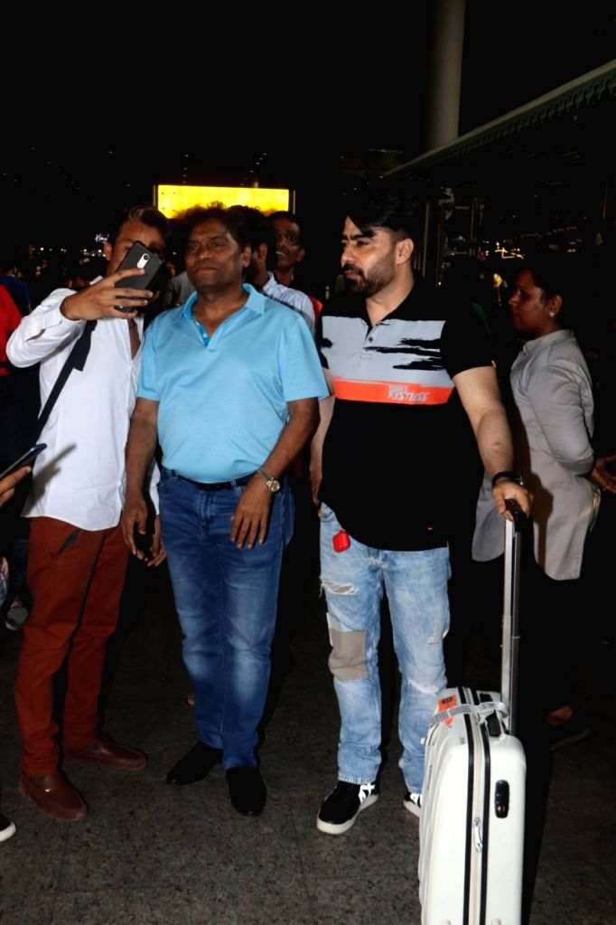 Johnny Lever, Shahroz Ali Khan seen at Mumbai Airport