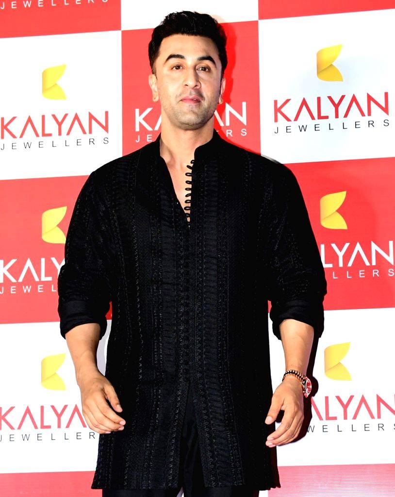 Actor Ranbir Kapoor poses for photos during an event by Kalyan Jewellers