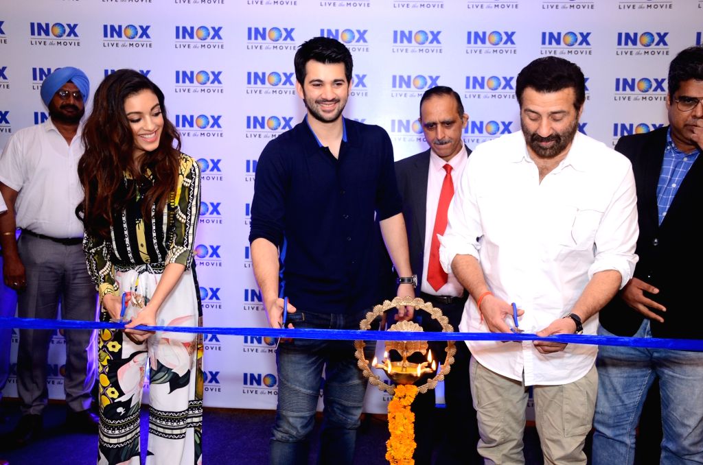 Sunny Deol, Karan Deol and Sahher Bambba at the launch of a cinema hall