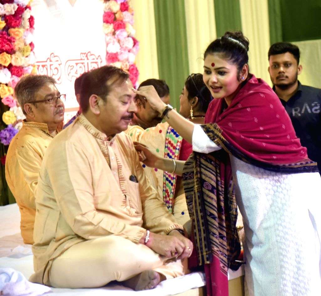 Actress and TMC MP Saayoni Ghosh applies tilak to State Minister Aroop ...