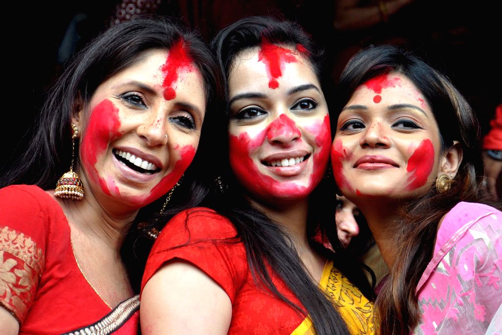 Celebrities during 'Sindoor Khela' at Chalta Bagan Durga Puja pandal