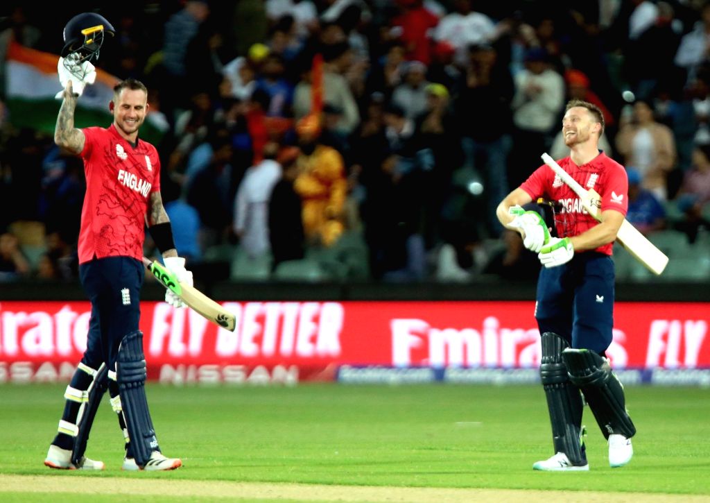 Adelaide : England's Jos Buttler and Alex Hales celebrate after winning ...
