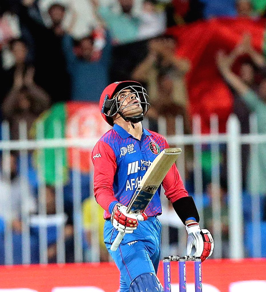 :Sharjah:Afghanistan's Rahmanullah Gurbaz celebrates after scoring a ...