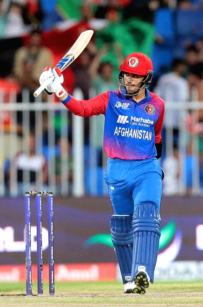 :Sharjah:Afghanistan's Rahmanullah Gurbaz celebrates after scoring a ...