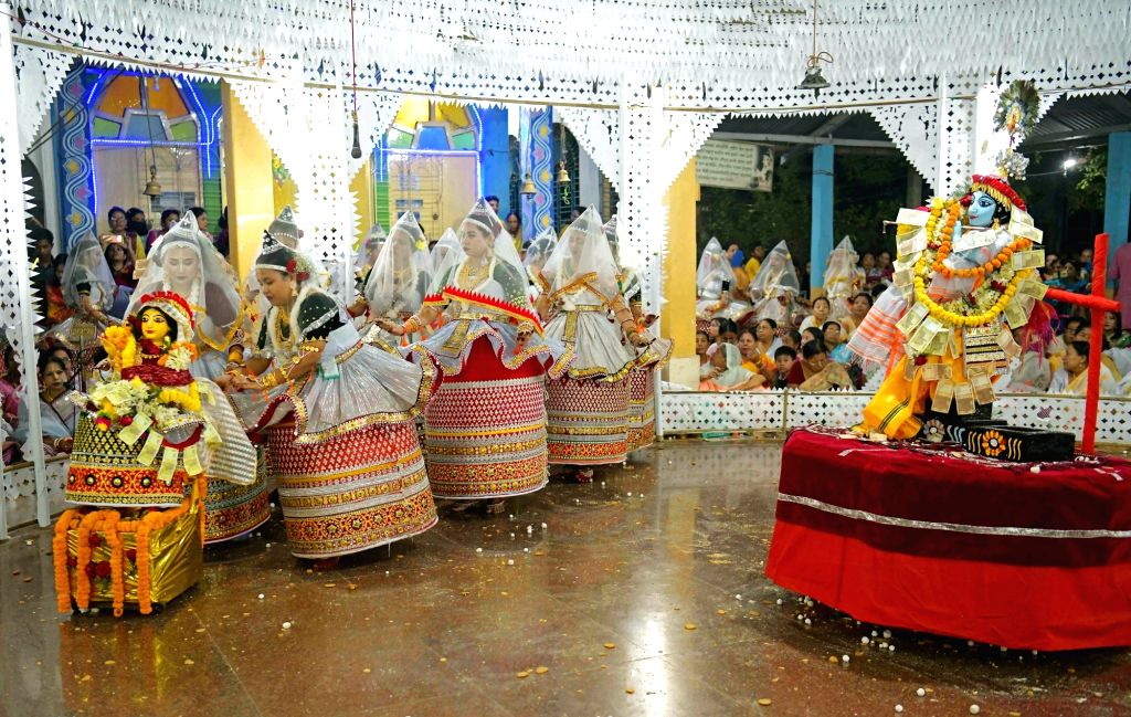 : Agartala : Artists wearing traditional attire performing during the ...