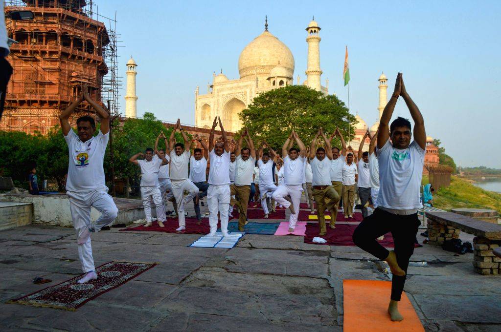 Agra : People perform yoga on the occasion of International Yoga Day at ...