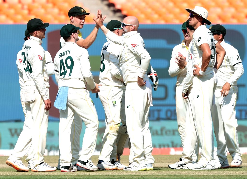: Ahmedabad :Australian bowler Nathan Lyon celebrates with teammates ...