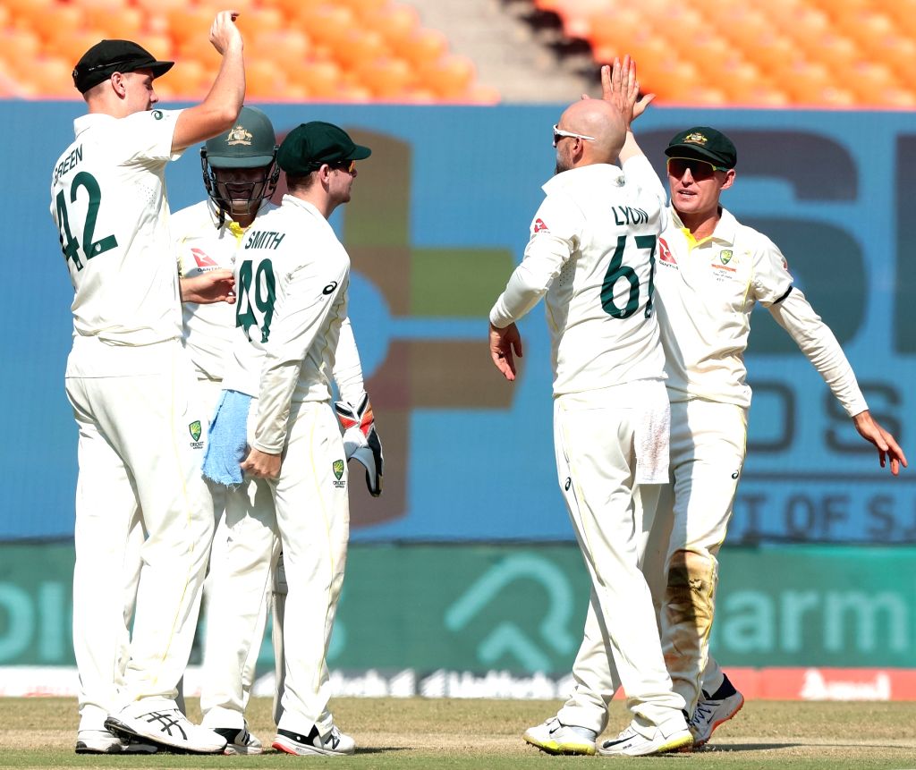 : Ahmedabad :Australian bowler Nathan Lyon celebrates with teammates ...
