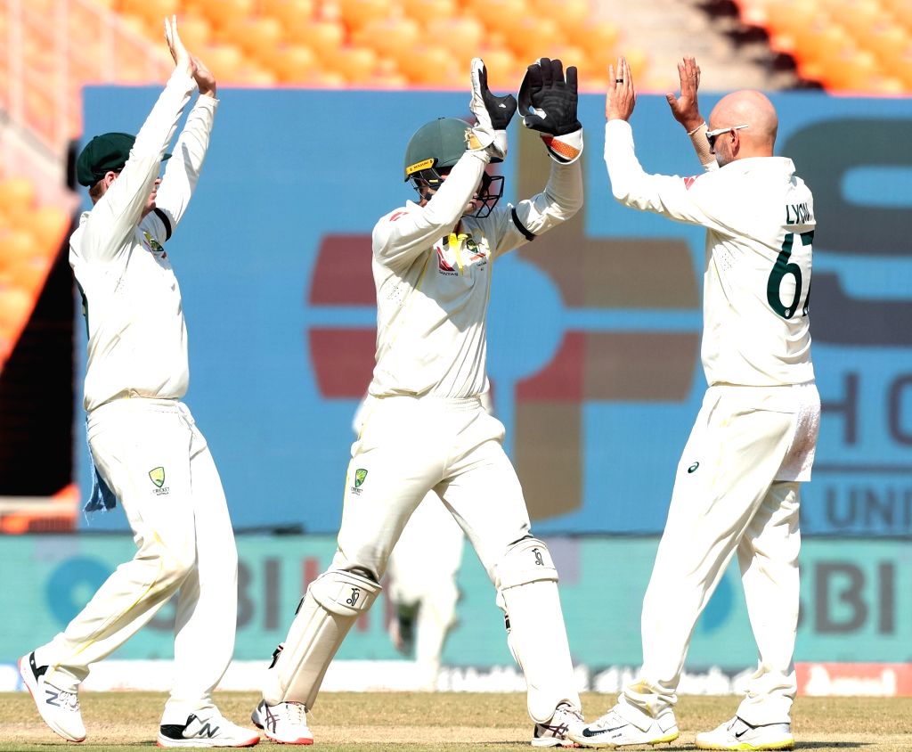 : Ahmedabad :Australian bowler Nathan Lyon celebrates with teammates ...