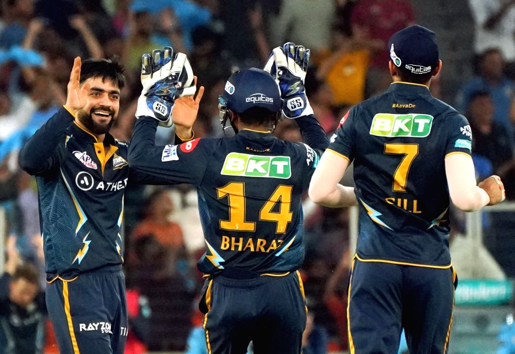 Ahmedabad : GT captain Rashid Khan celebrates the wicket of KKR batsman ...
