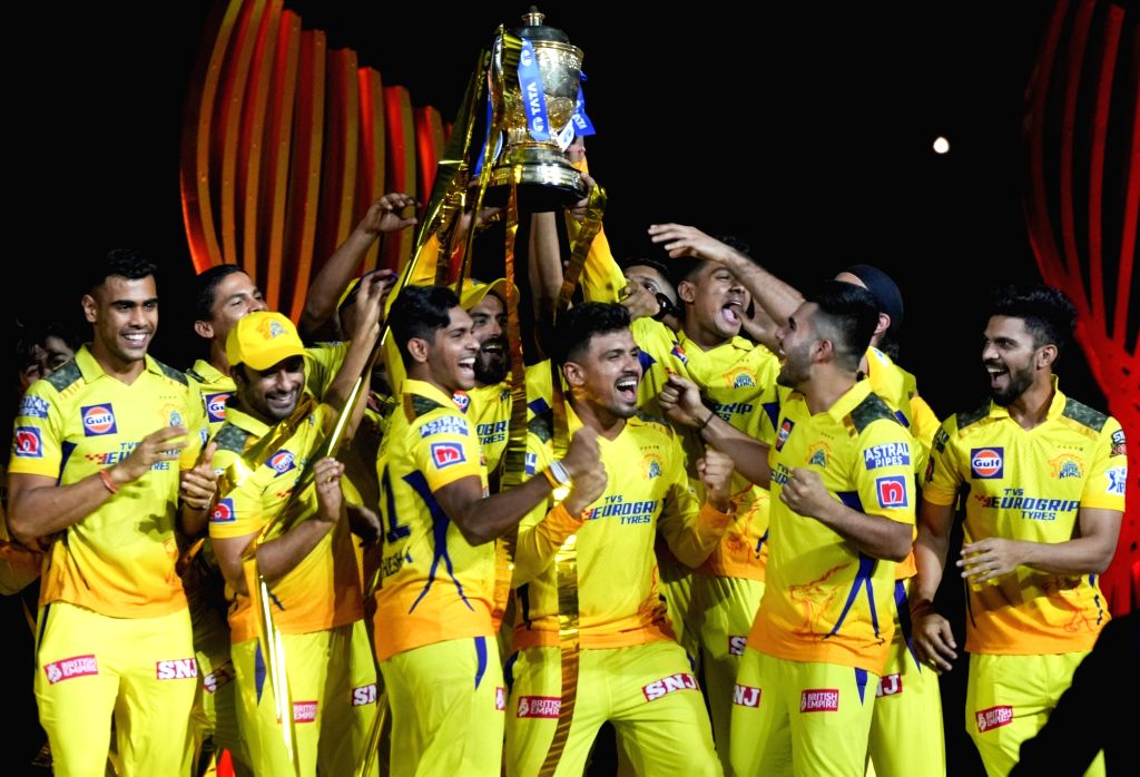 Ahmedabad : Players of Chennai Super Kings celebrate with the winners ...