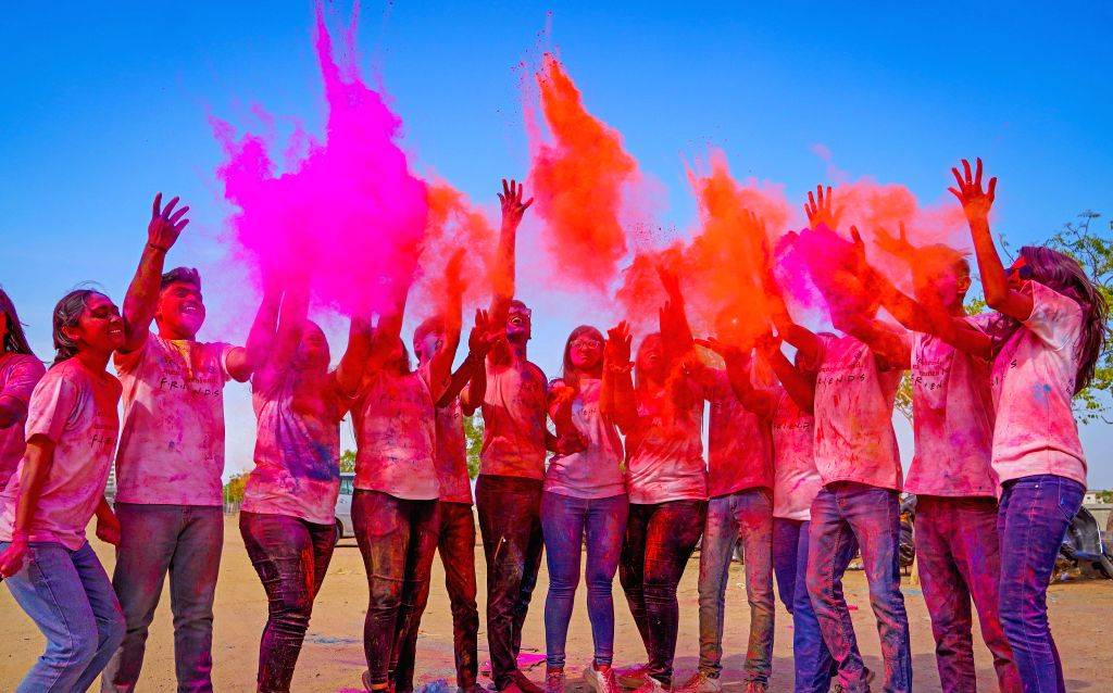 Ahmedabad : Students play with colours as they celebrate Holi at ...