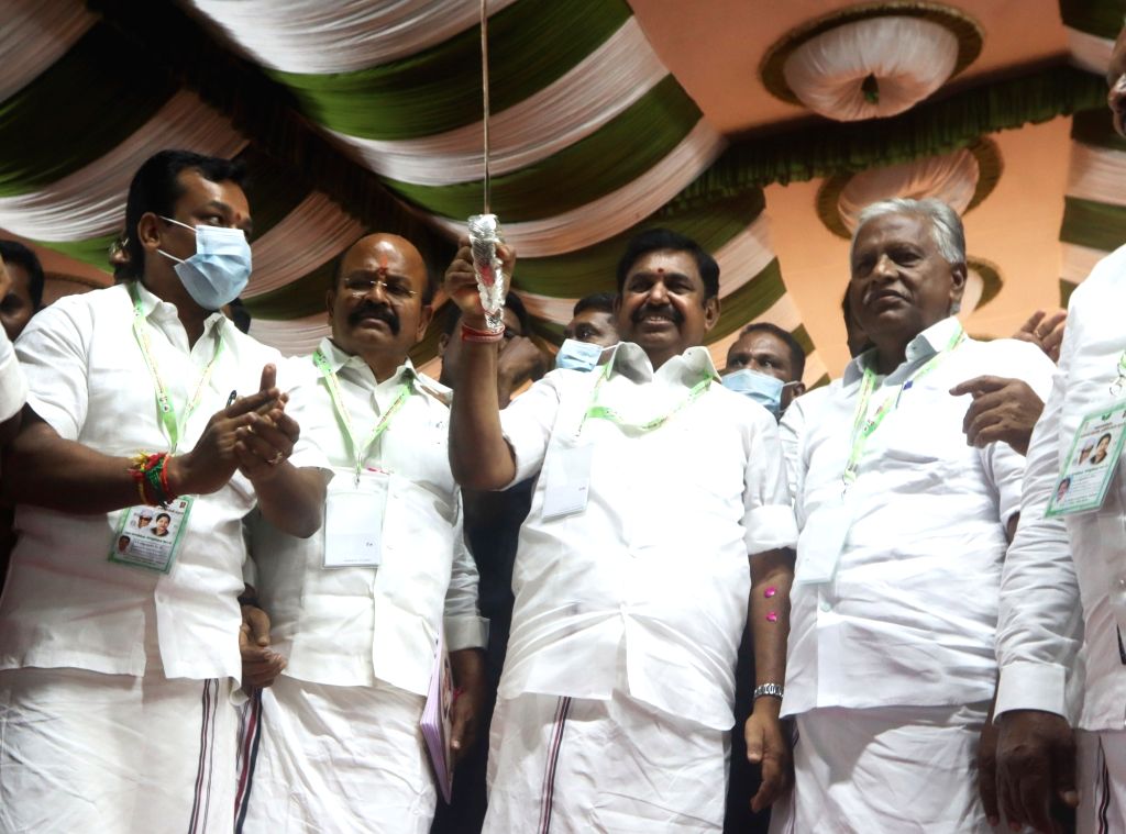 AIADMK leader E Palaniswami holds a sword during Party's General ...