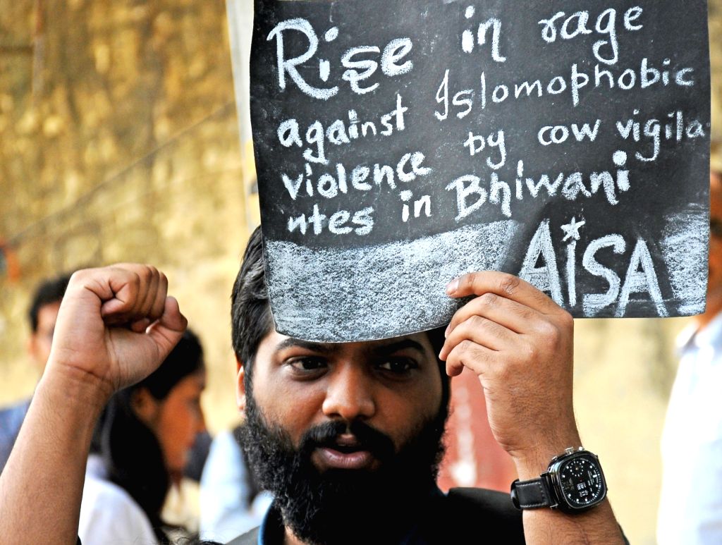 AISA supporters during a protest demanding justice for Junaid and Nasir