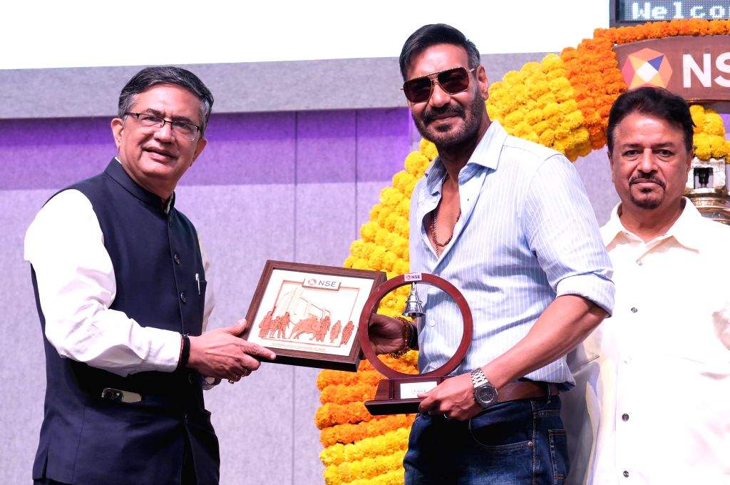 Ajay Devgn and 'Raid 2' team at NSE