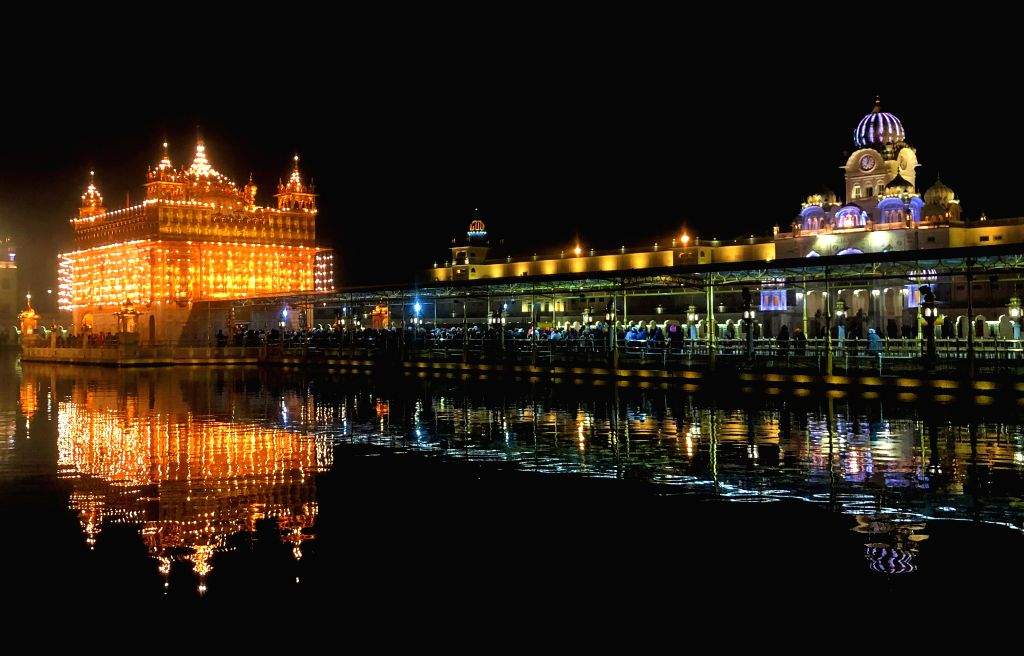 Amritsar : Illuminated Golden Temple on the eve of the birth ...