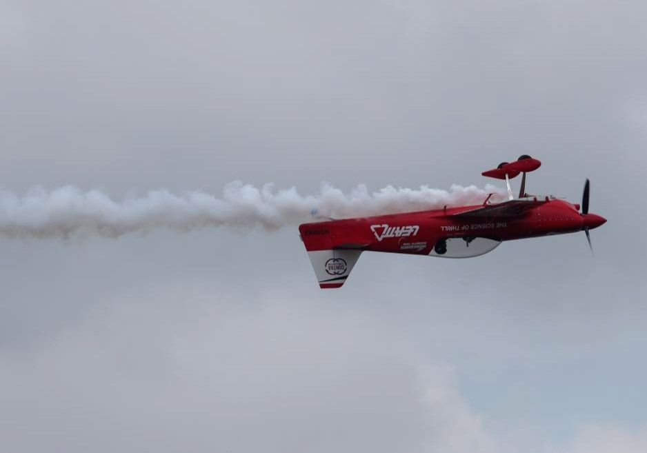 An aircraft gives aerobatic performance during the Museum Air Show ...