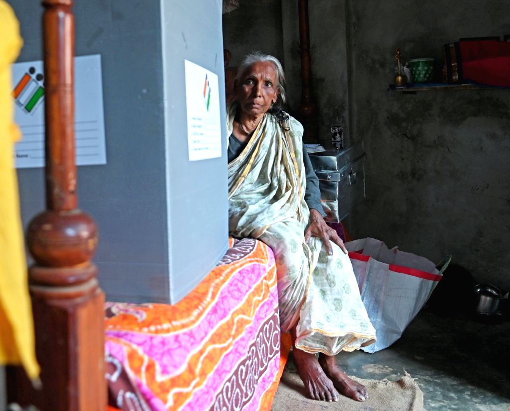 : Agartala: An elderly woman voter during door-to-door voting