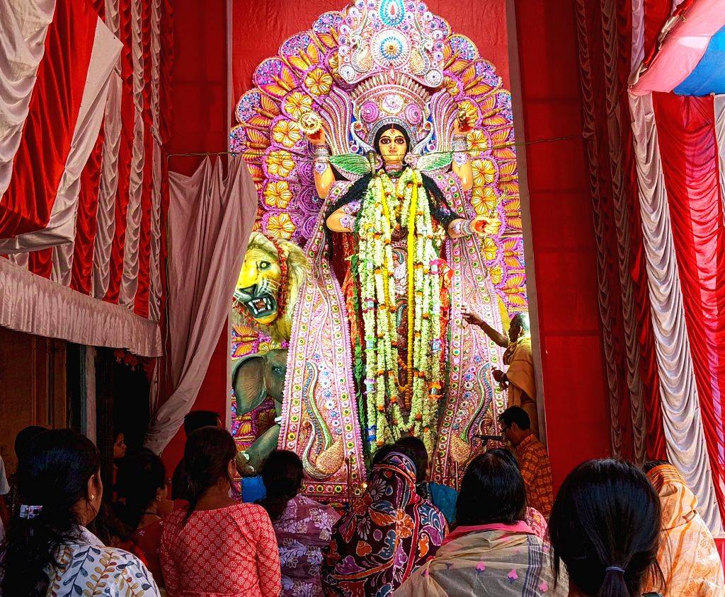 An idol of Goddess Jagaddhatri is displayed at a puja pandal