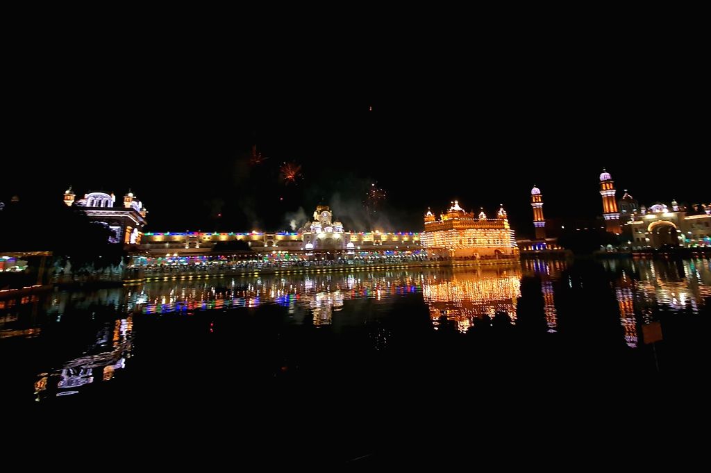 An illuminated Golden Temple on the occasion of the birth anniversary ...