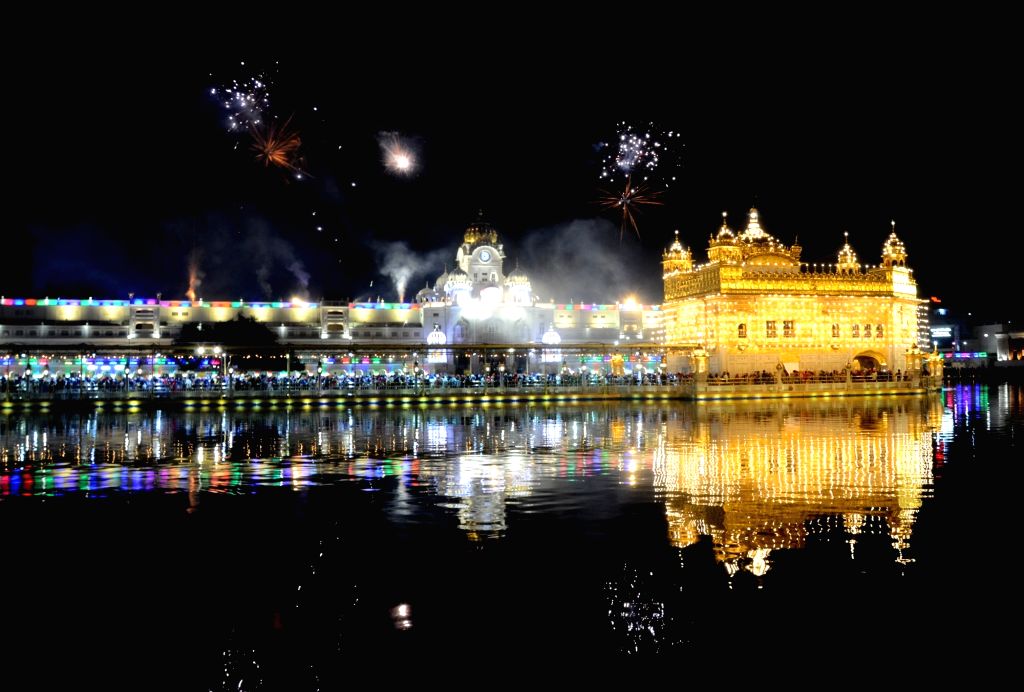 An illuminated Golden Temple on the occasion of the birth anniversary ...