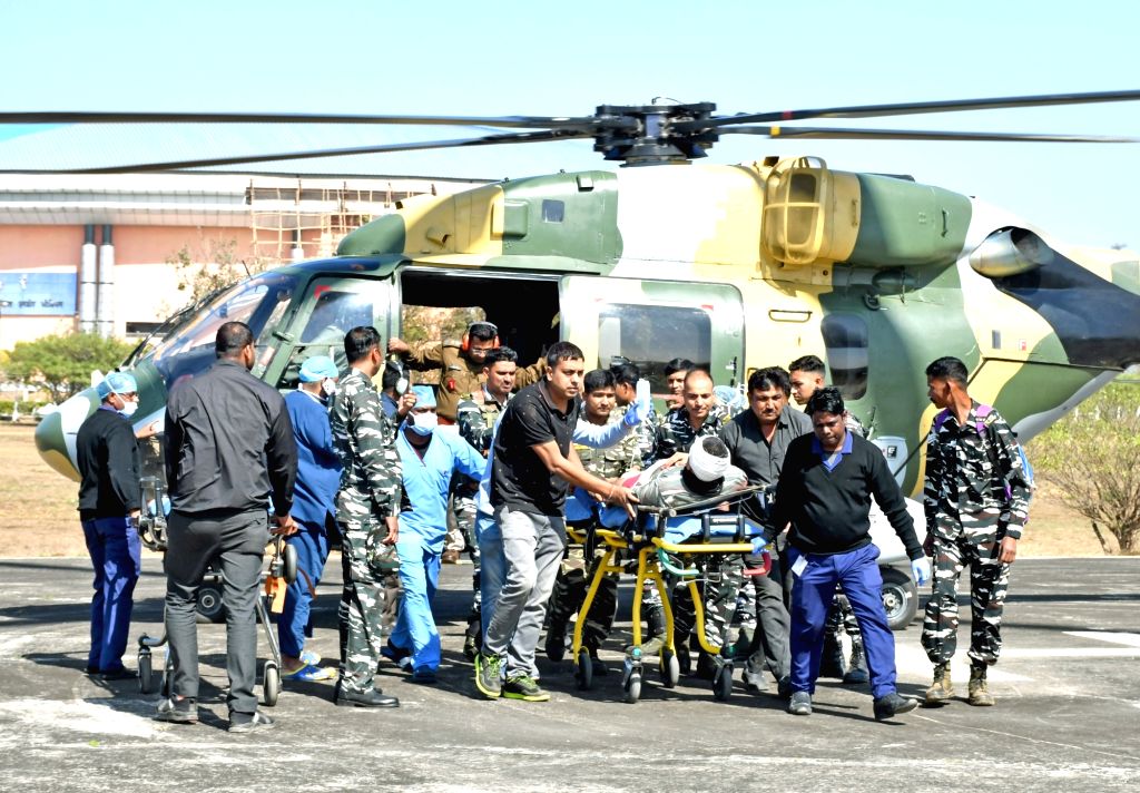 An injured paramilitary jawan of CRPF is being taken to hospital for ...