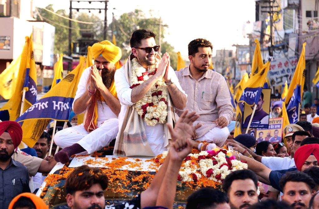 Anandpur Sahib: AAP Rajya Sabha MP Raghav Chadha holds a roadshow in ...