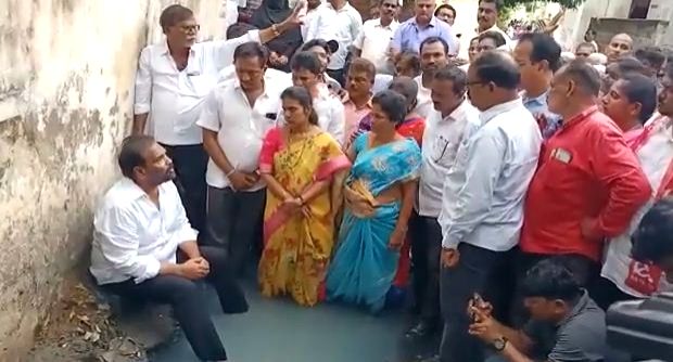 Andhra's ruling party MLA enters drain in novel protest