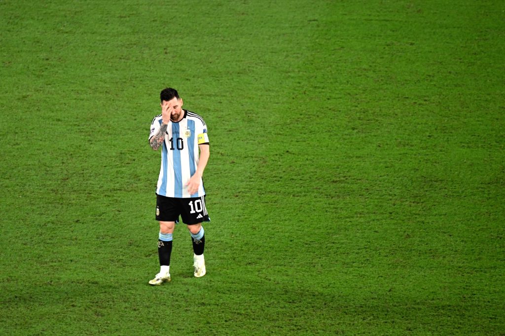 :Doha:Argentina's Lionel Messi reacts during the World Cup round of 16 ...