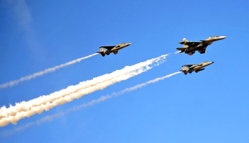 Army aircrafts fly past during the 75th Army Day celebrations