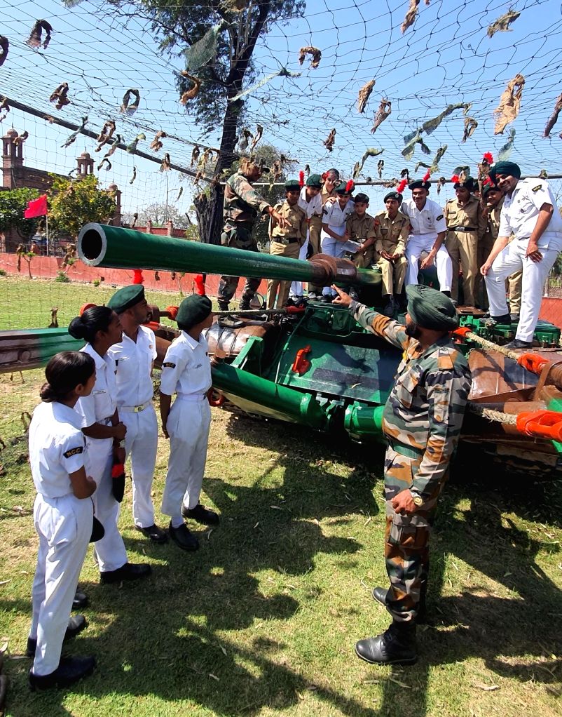 Army personnel display army equipment at the Khalsa College campus