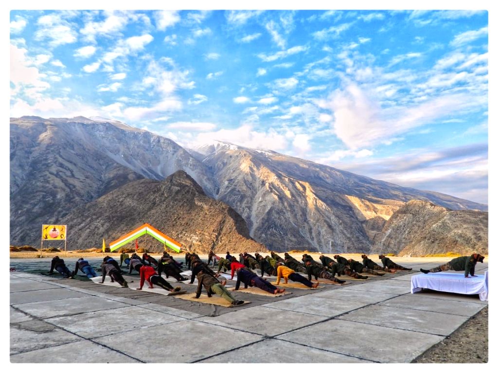 Free Photo : Army soldiers did yoga at an altitude of 15000 feet in Ladakh.